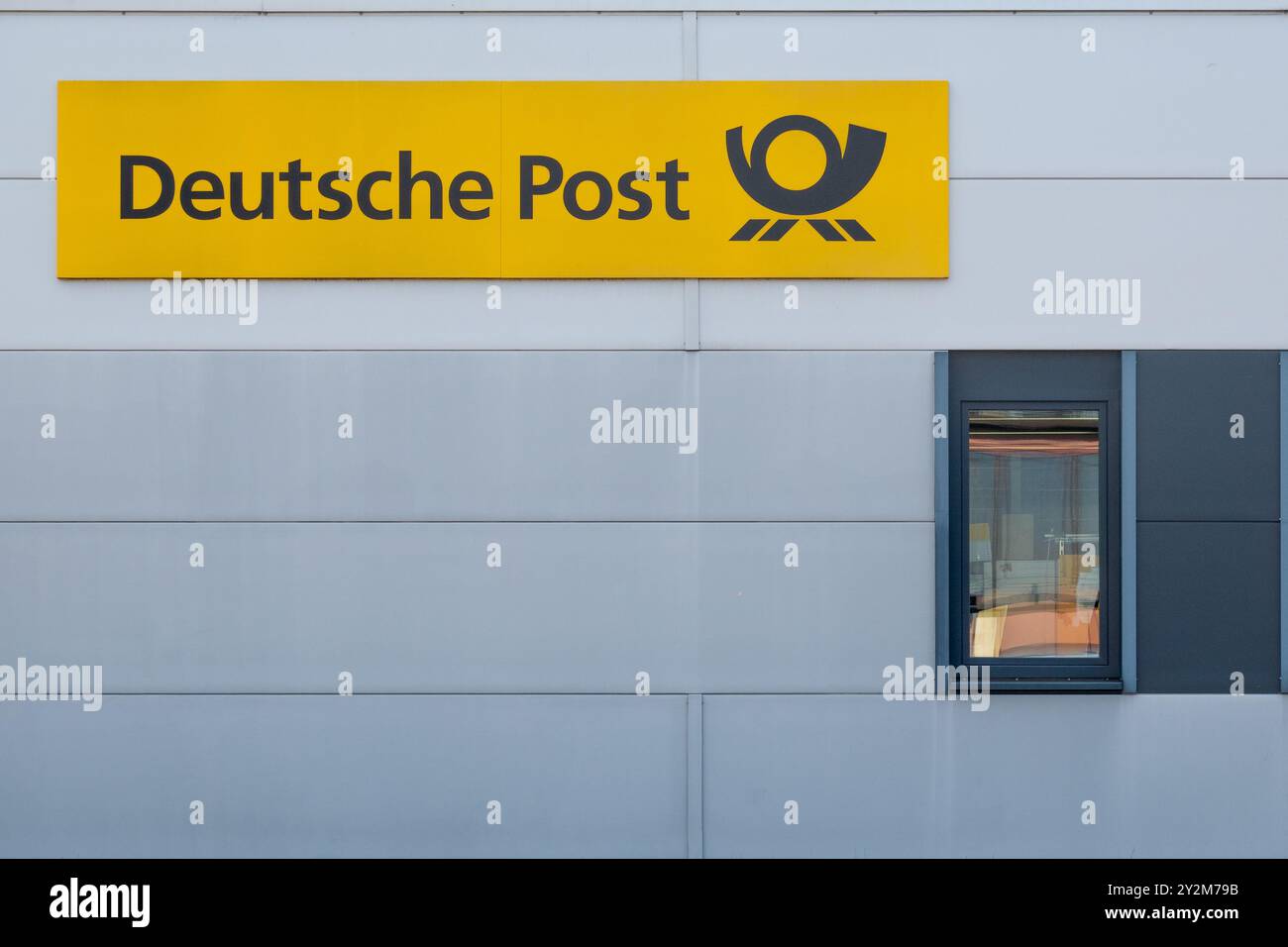 Trier, Germany - September 7, 2024: The exterior of a postal office building showcases the ...