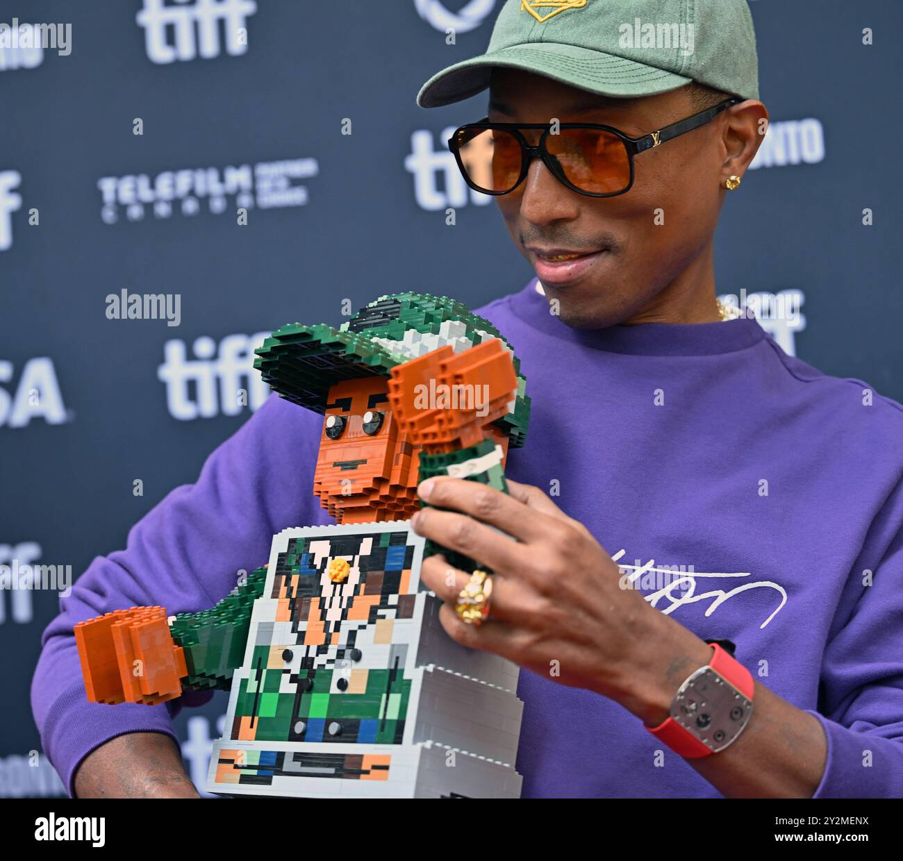 Toronto, Canada. 10th Sep, 2024. Pharrell Williams raises lego Pharrell ...