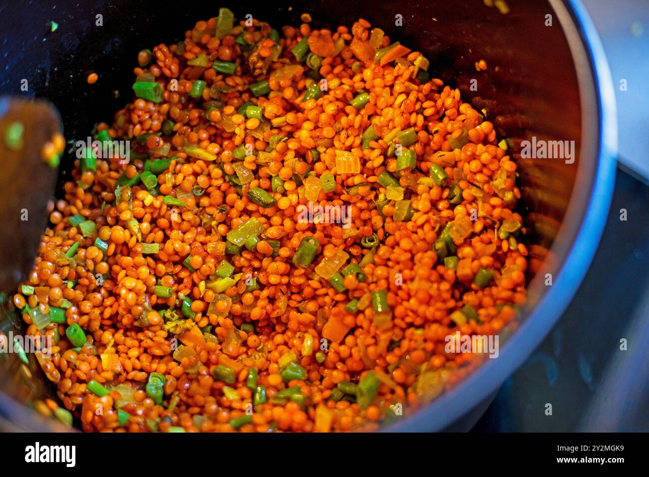 cooking red lentil soup. Vegetable protein Stock Photo - Alamy