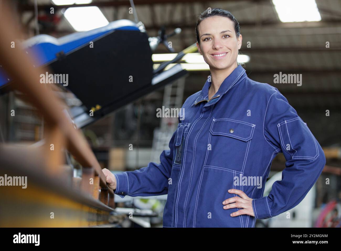 Female machinery operative hi-res stock photography and images - Alamy
