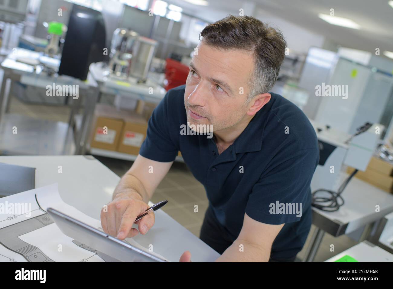 plotter printing an architectural plan Stock Photo - Alamy