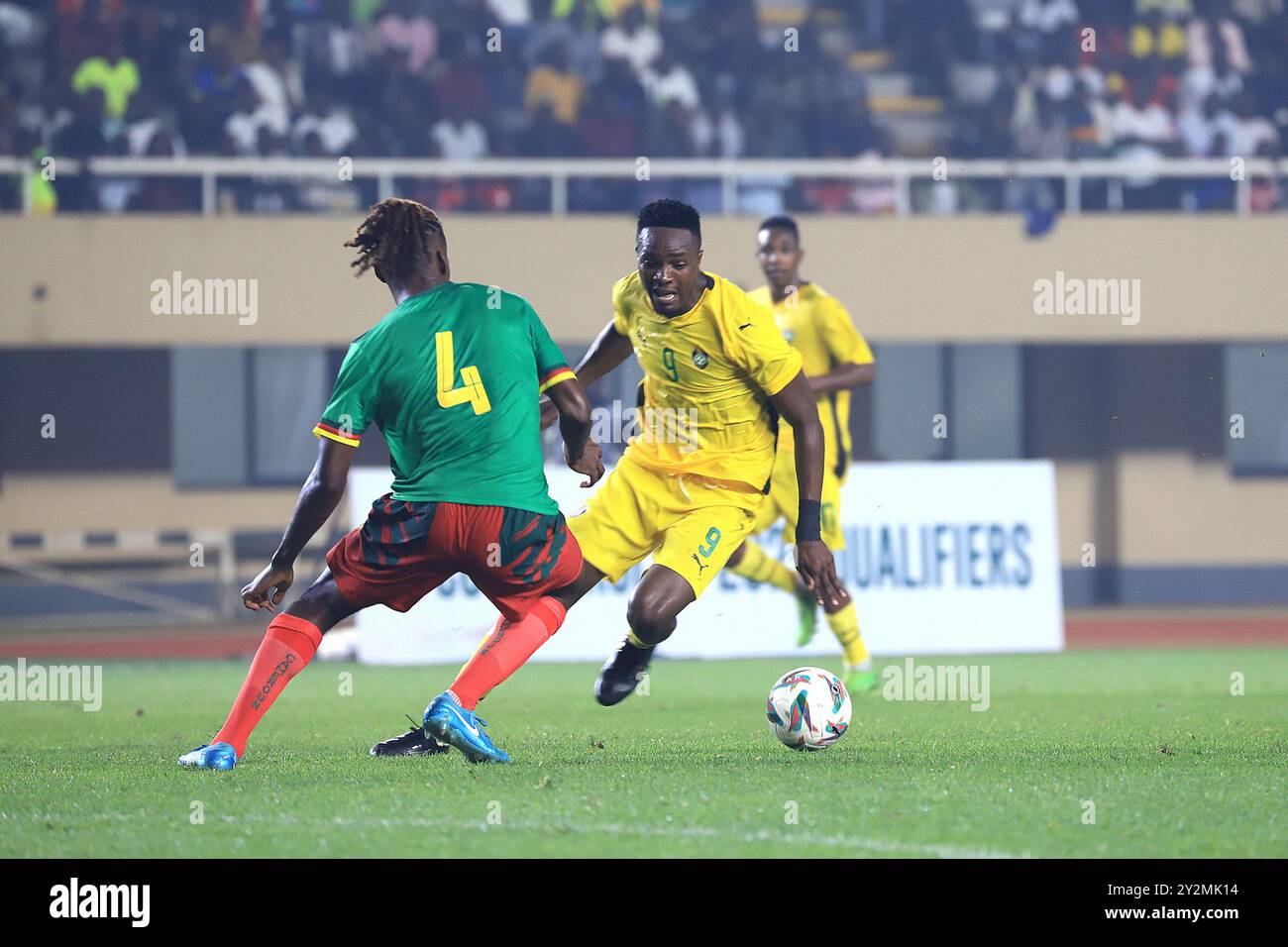 Kampala. 10th Sep, 2024. Douglas Tinashe Mapfumo (front R) of Zimbabwe ...