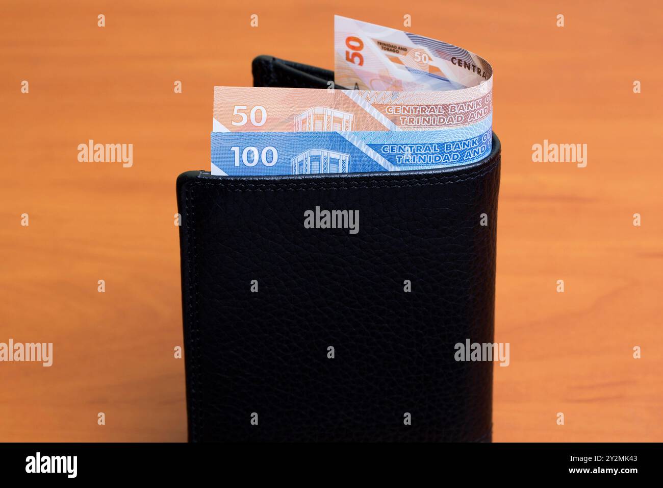 Trinidad and Tobago money - dollar in the black wallet Stock Photo - Alamy