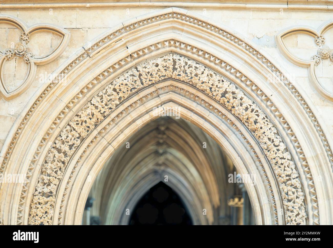 Detail of the decorated arch above the entrance to the south chancel ...