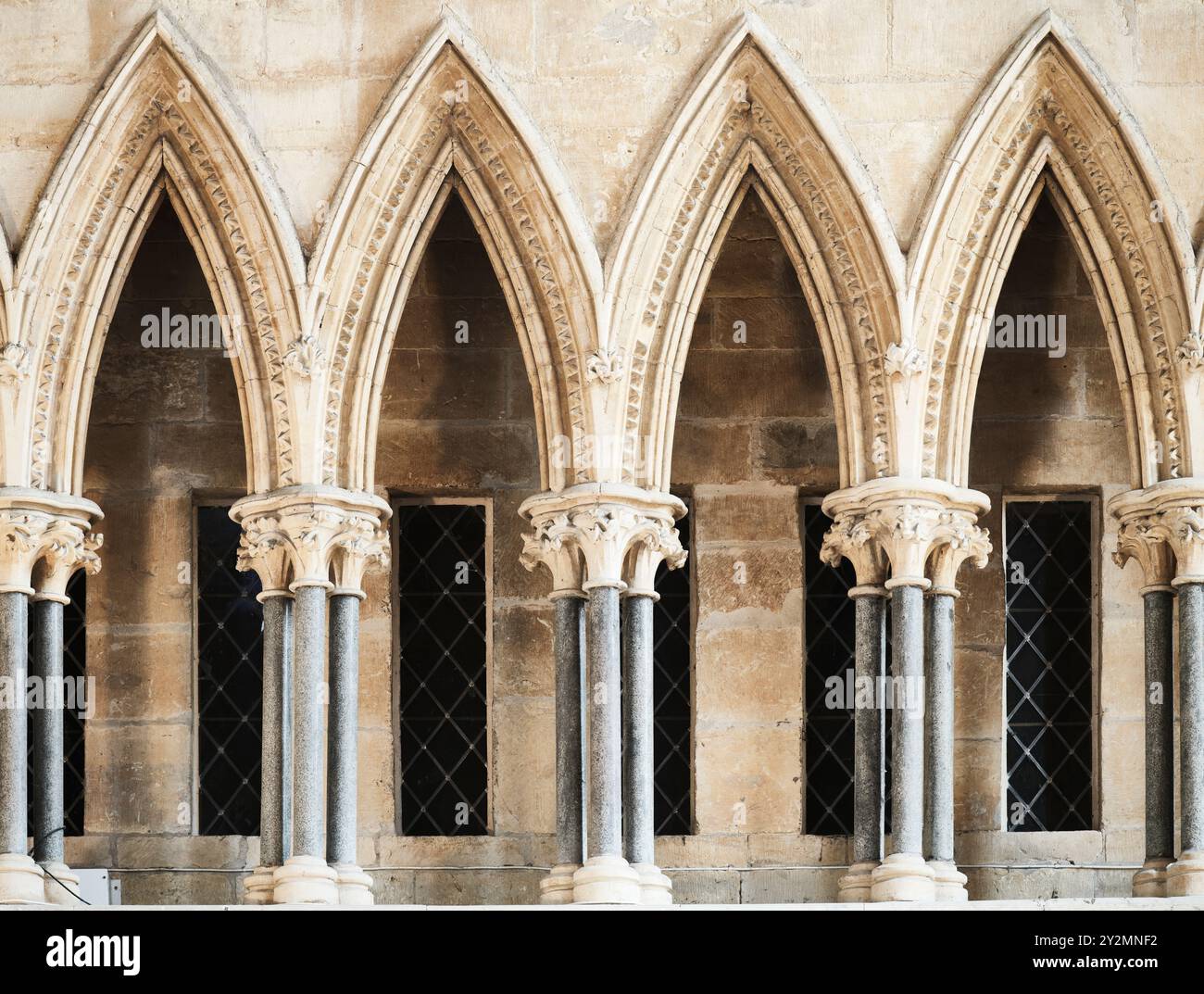 Slender arches in the chapter house at the gothic cathedral at Lincoln ...