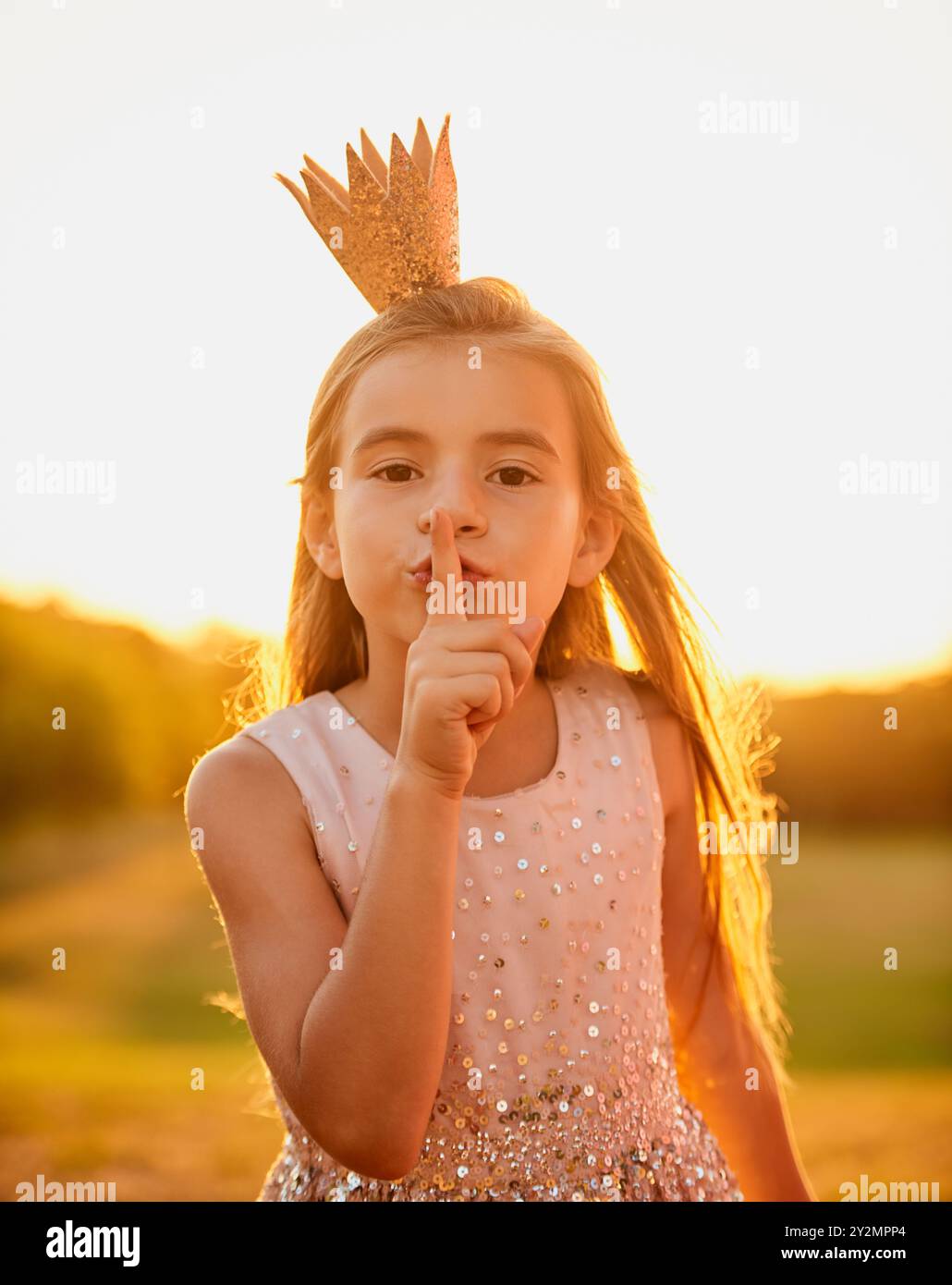 Girl, child portrait and shush in nature, outdoor princess and finger ...