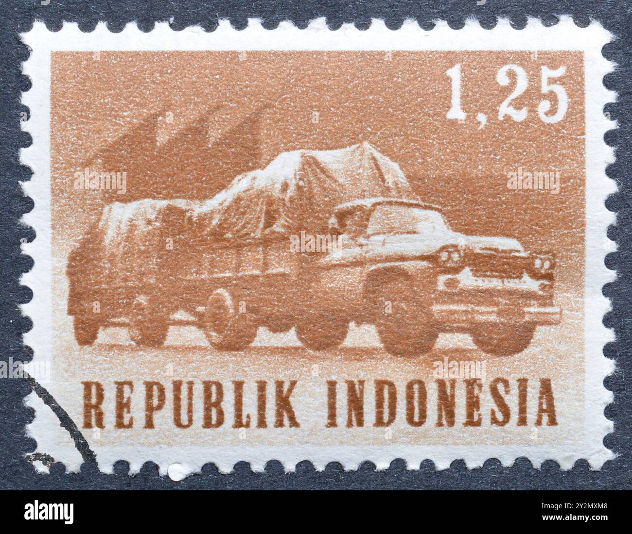 Cancelled postage stamp printed by Indonesia, that shows Lorry and ...