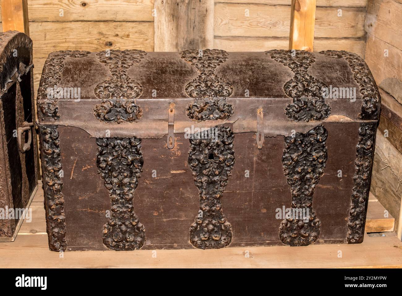 Old wooden chest against wooden wall Stock Photo - Alamy