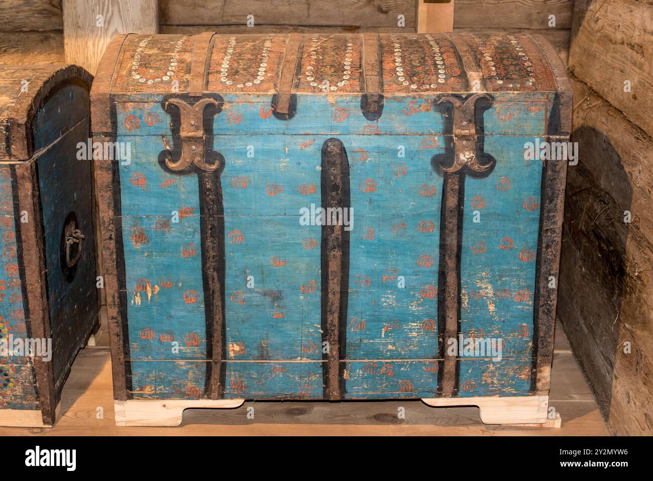 Old wooden chest against wooden wall Stock Photo - Alamy