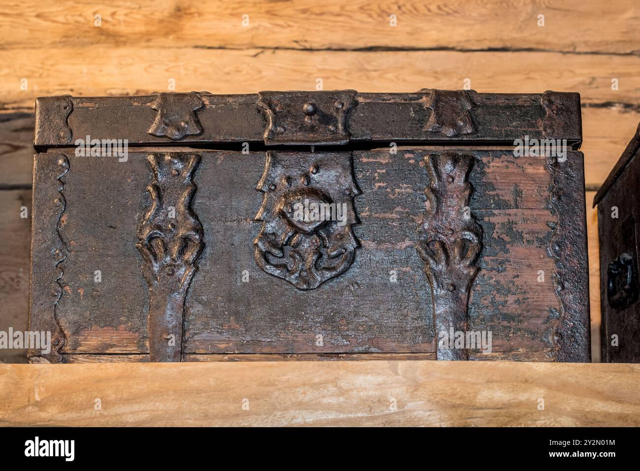 Old wooden chest against wooden wall Stock Photo - Alamy