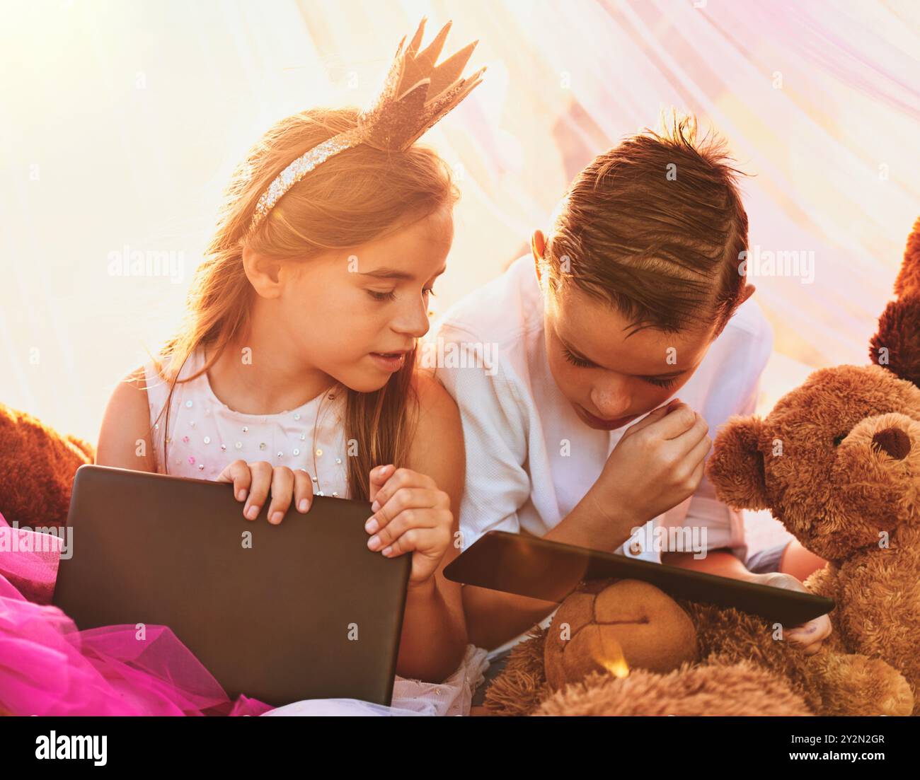 Children, tablet and fort for streaming movies, playing dress up and ...