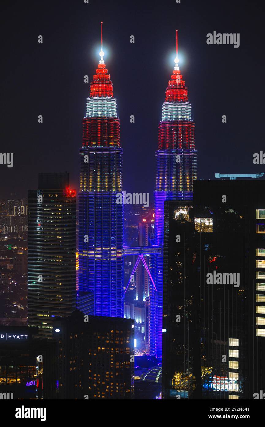 Petronas Twin Towers (KLCC) with Malaysia flag colors, in Kuala Lumpur ...