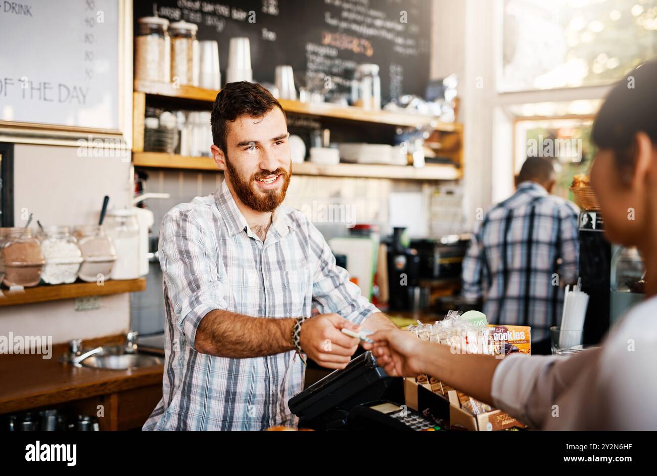 Coffee shop, payment and man with customer for service, checkout and ...