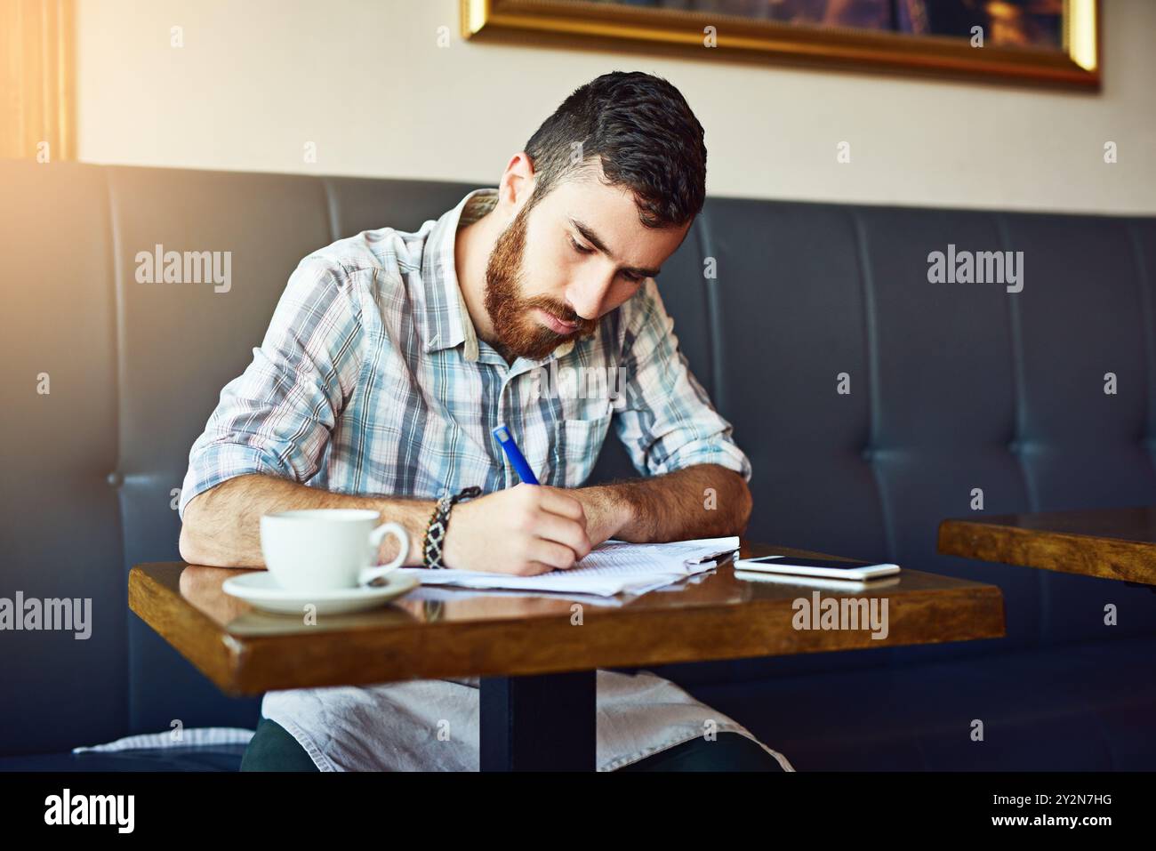 Coffee shop, writing and man with checklist for inventory, menu items ...