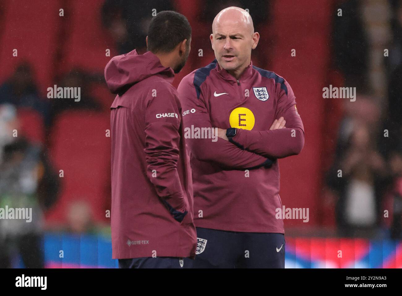 Interim Head Coach of England, Lee Carsley speaks with Assistant ...