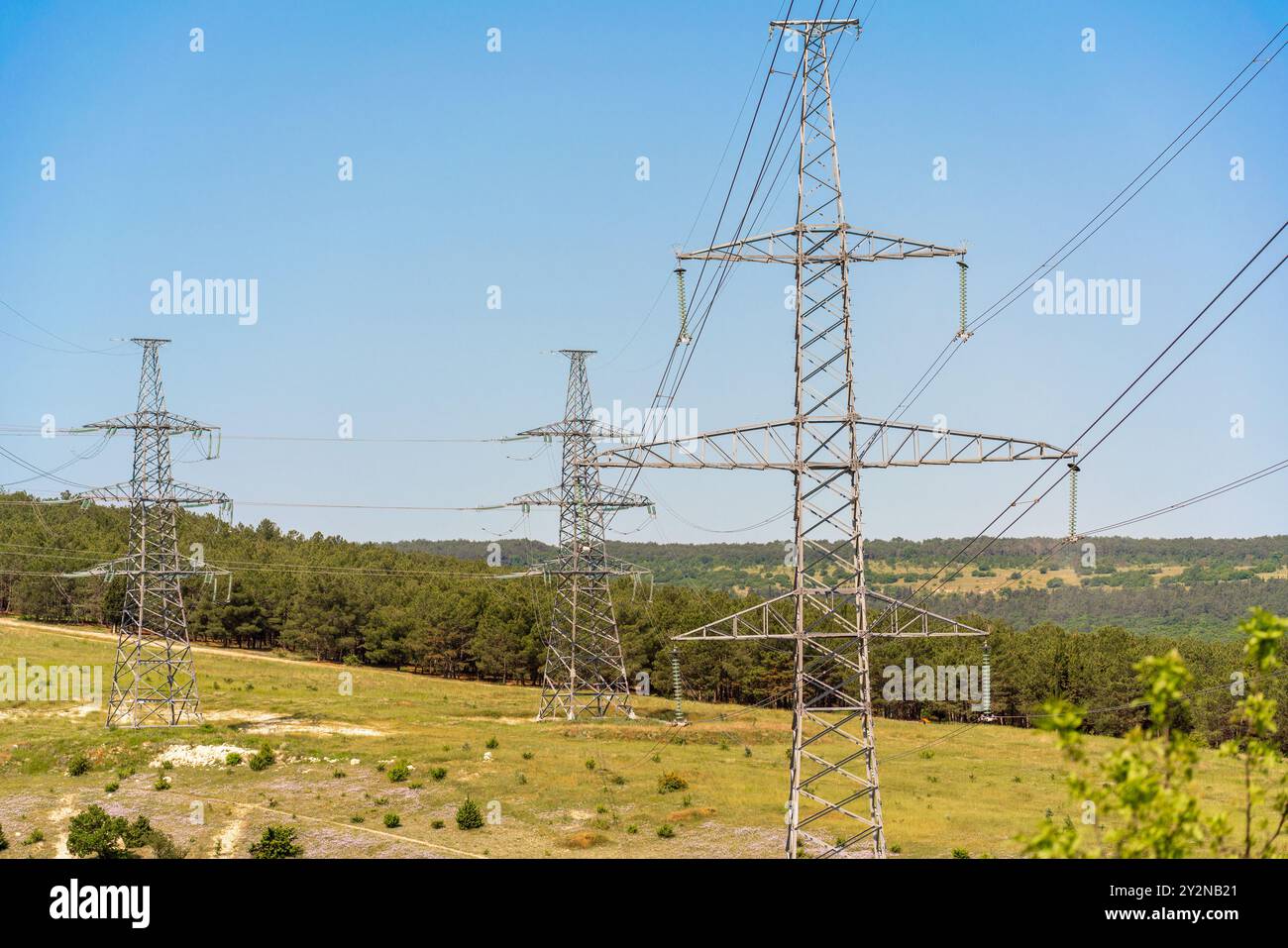 High voltage towers Electric pole. Power line support with wires for ...