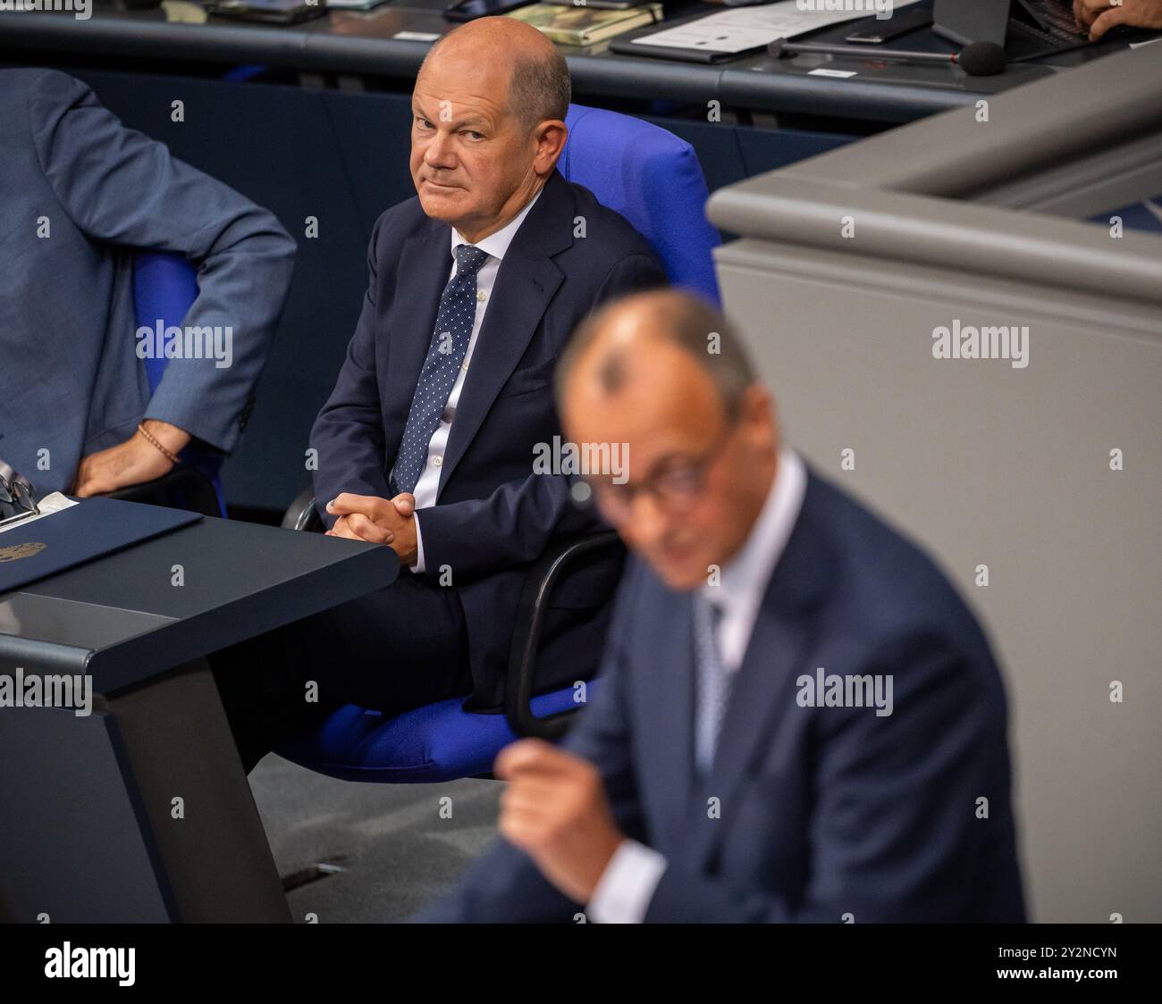Berlin, Germany. 11th Sep, 2024. Federal Chancellor Olaf Scholz (SPD), looks at Friedrich Merz ...