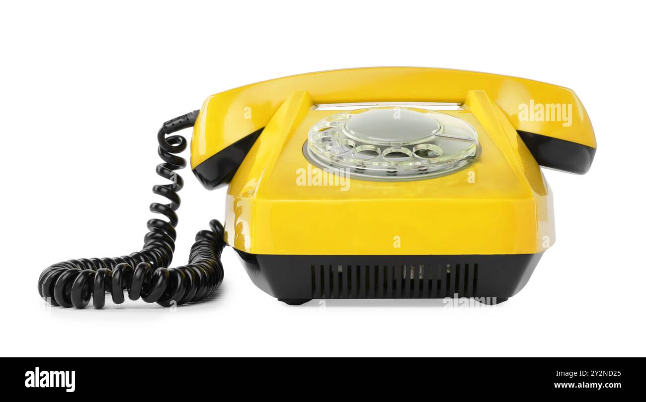 Old fashioned yellow rotary telephone hi-res stock photography and ...