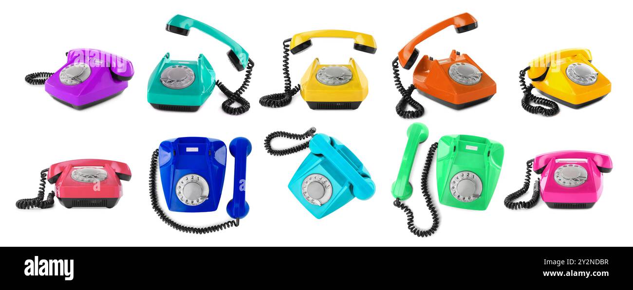 Old telephone with rotary dial of different colors isolated on white ...
