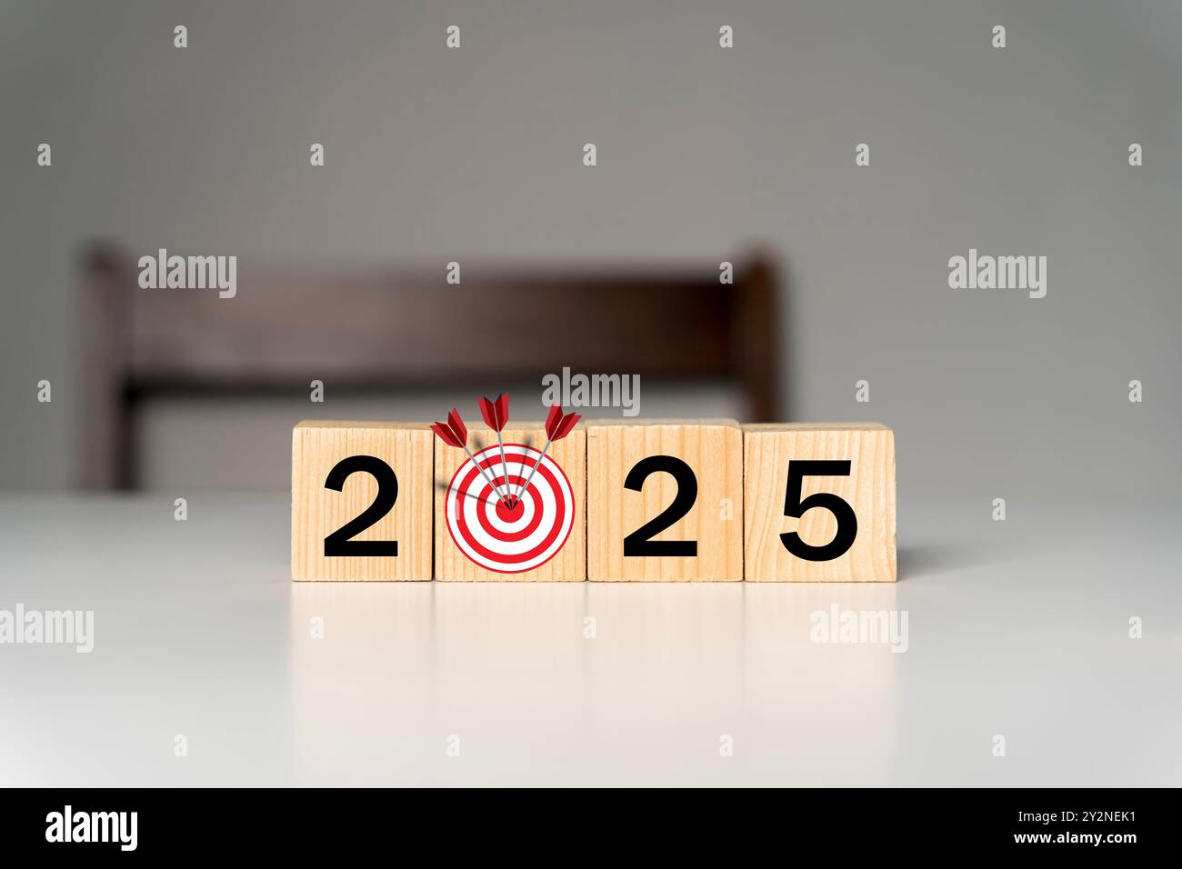 2025 business goals. Wooden block with 2025 word and target icon. set ...