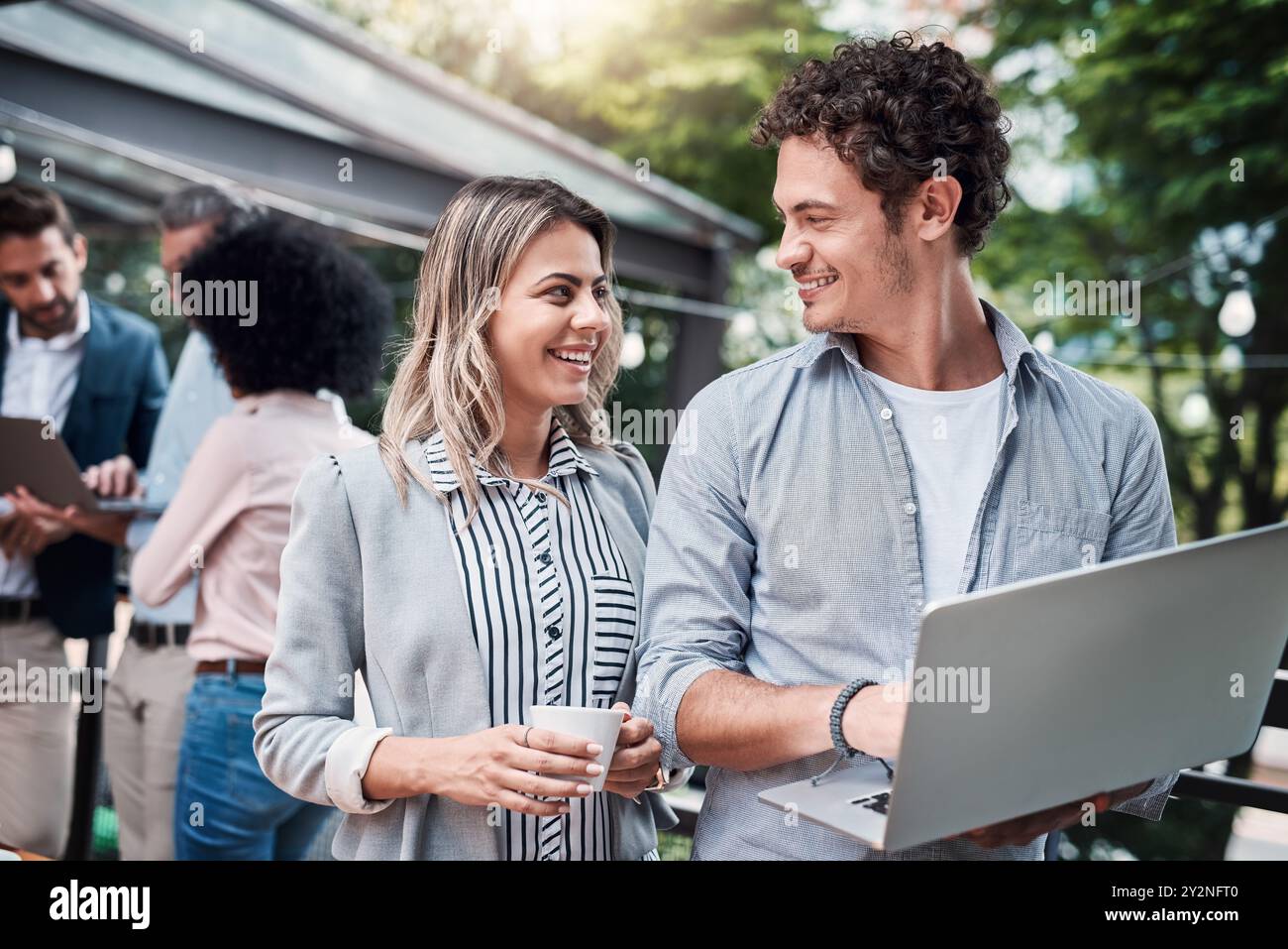 Laptop, discussion and business people at outdoor cafe for project ...