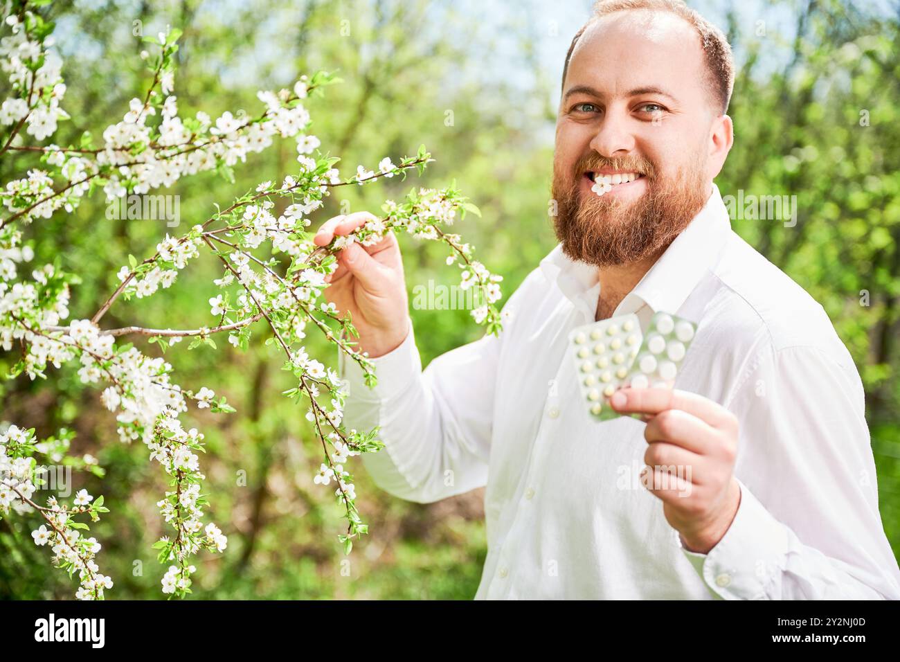 Man allergic suffering from seasonal allergy at spring. Handsome man ...