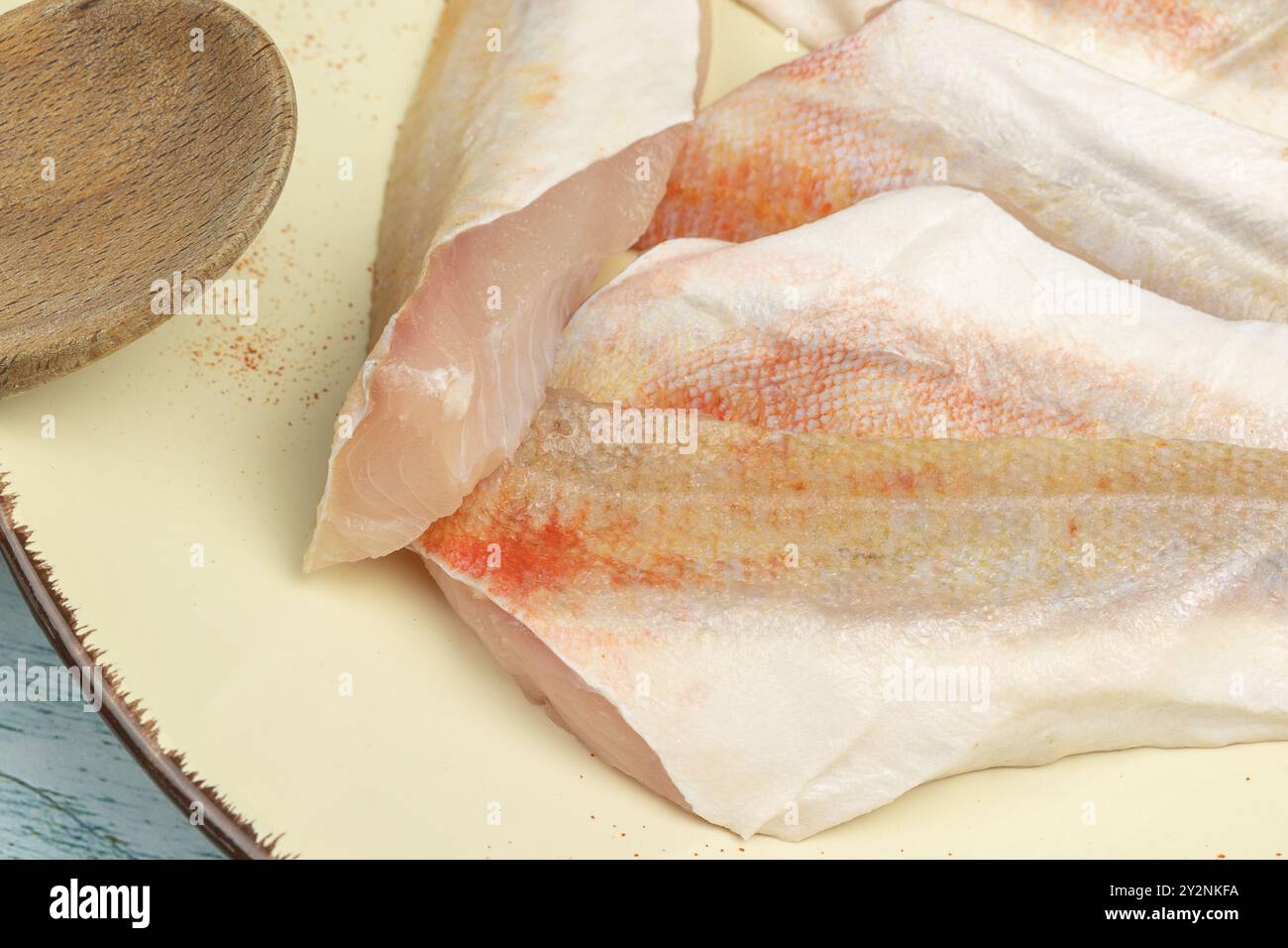 red gurnard fish fillet, close-up, on a plate Stock Photo - Alamy