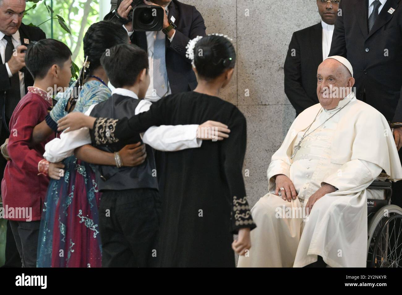 **NO LIBRI** Singapore, Dili, 2024/9/11 . Pope Francis is welcomed as ...