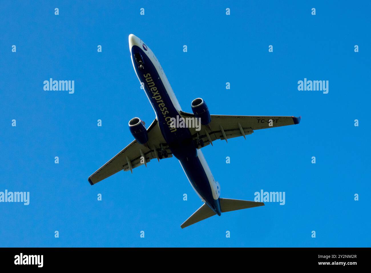 Boeing 737 Plane Low angle view of a SunExpress airplane flying ...