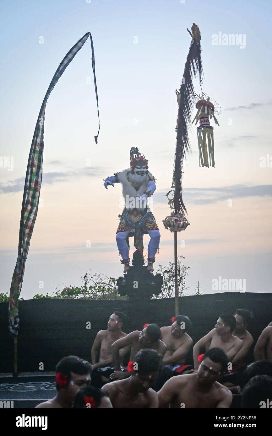 Balinese actor performing the typical Kecak dance on a stage in Uluwatu ...