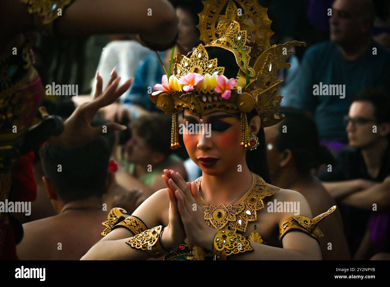 Balinese actress performing the typical Kecak dance on a stage in ...