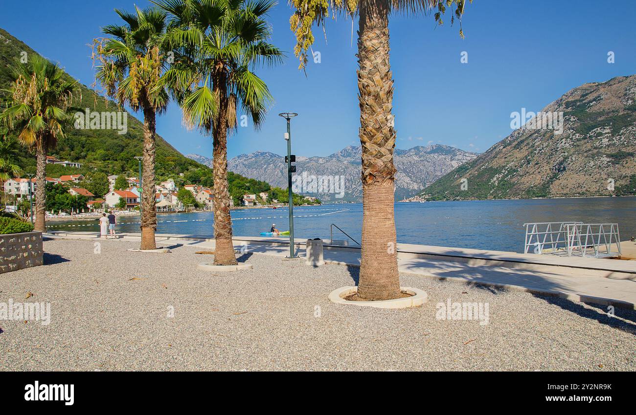 Stoliv village promenade looking across kotor bay towards perast town ...