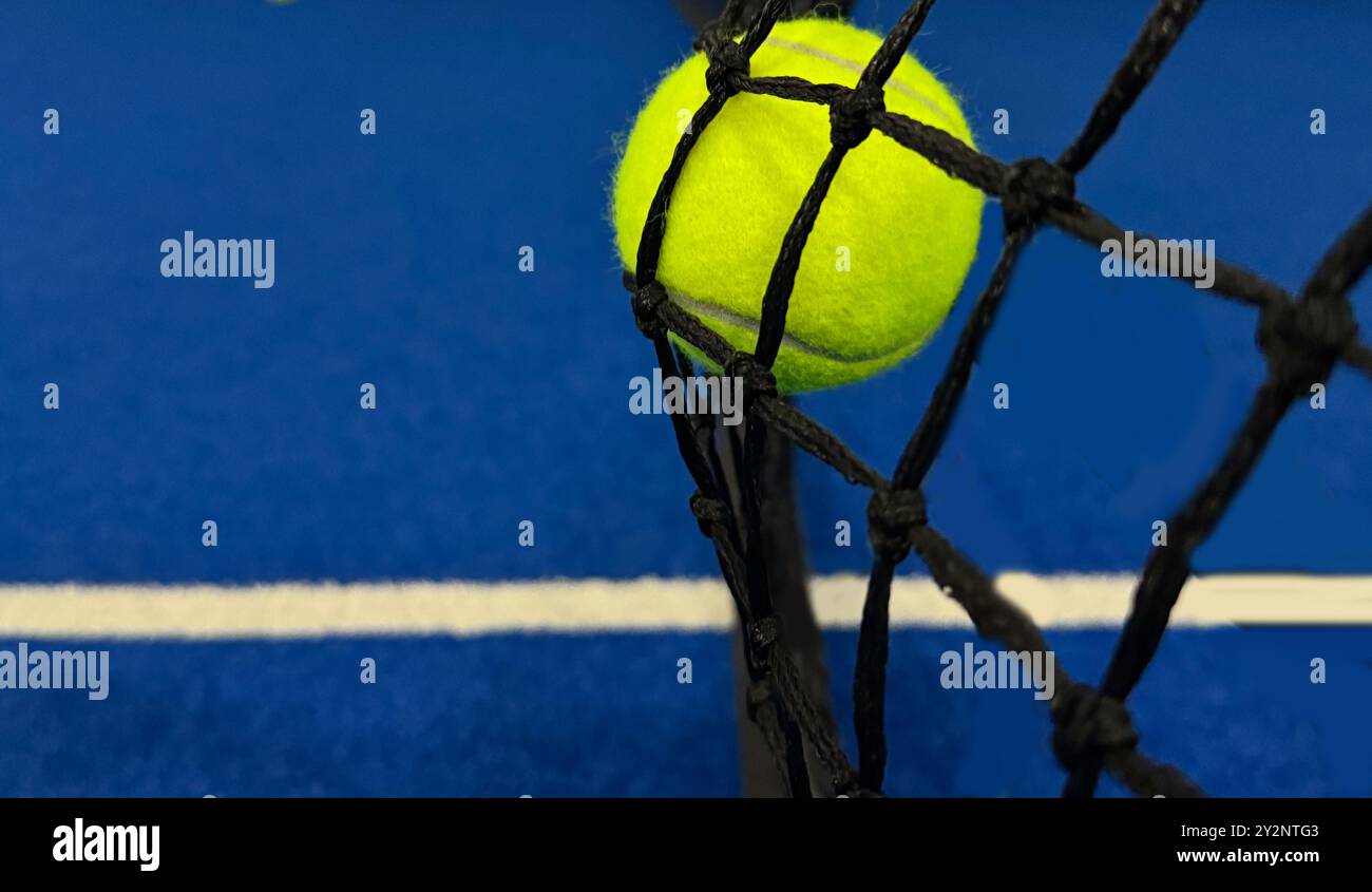 Tennis ball hitting on the net Stock Photo - Alamy