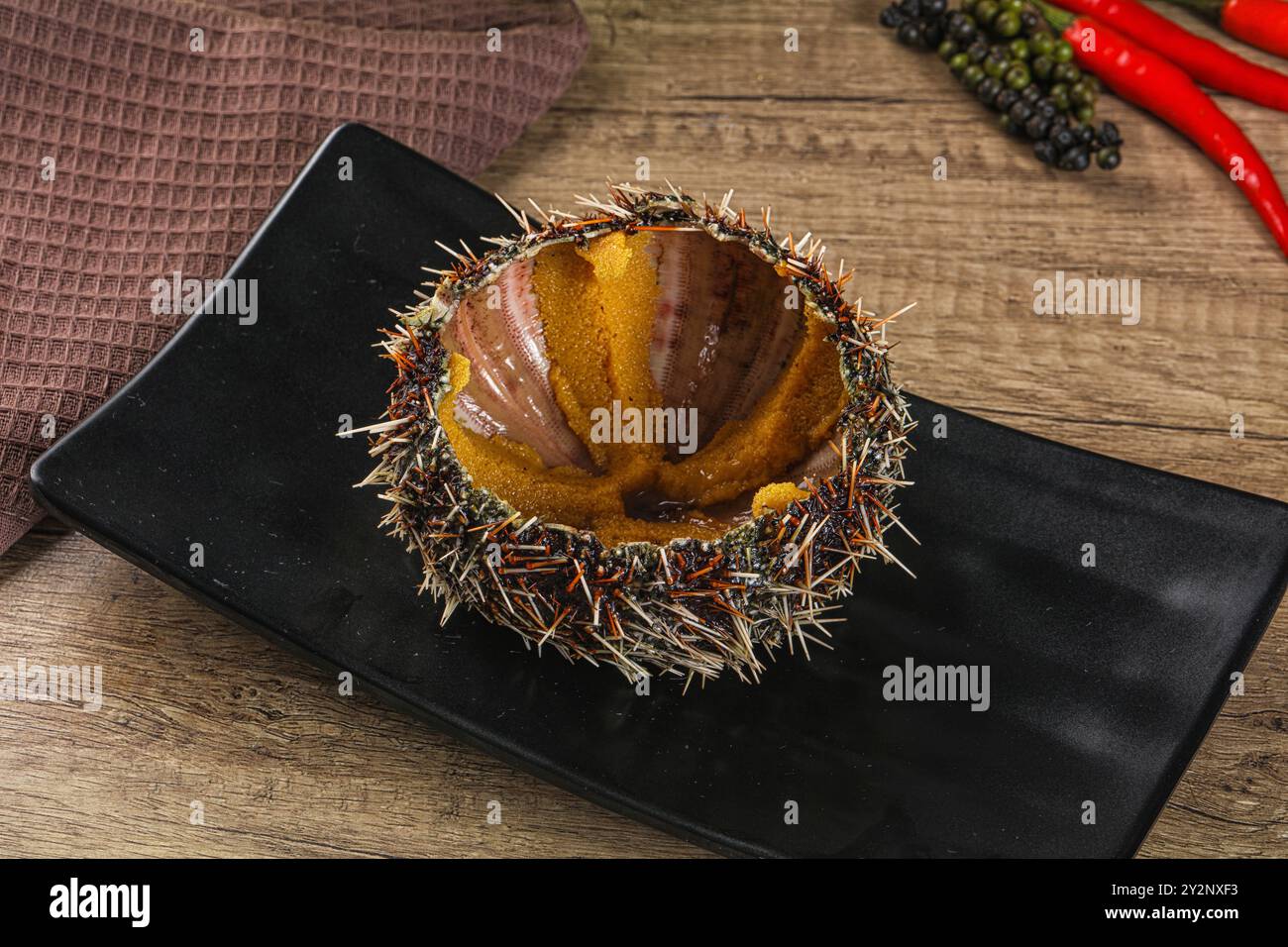 Delicous luxury raw sea urchin delicatessen Stock Photo - Alamy