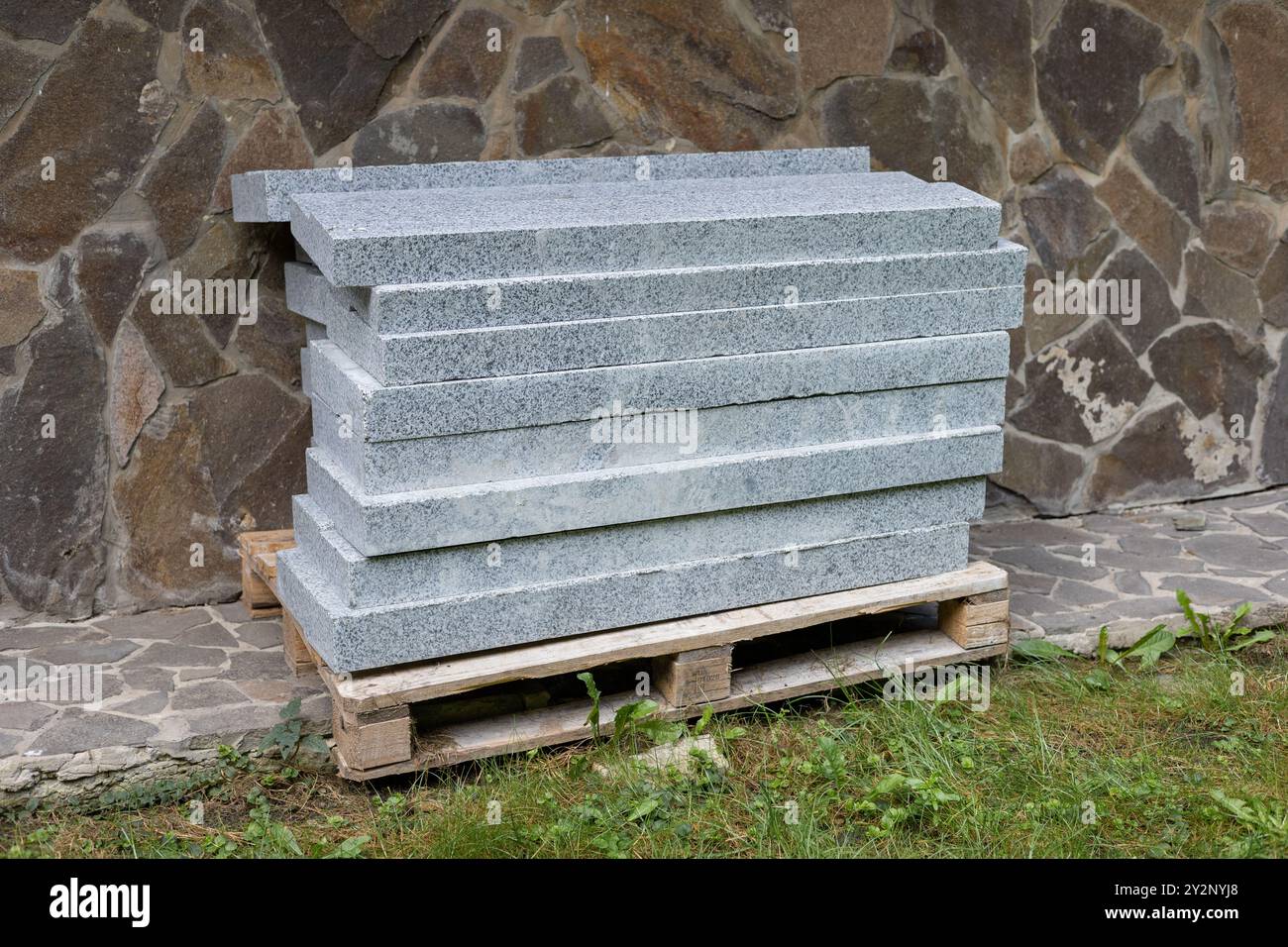 a stack of new curbs for road repair Stock Photo - Alamy