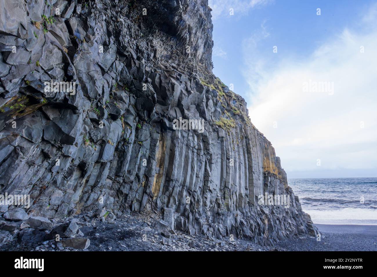 The dramatic basalt columns of Reynisfjara create a stunning backdrop ...