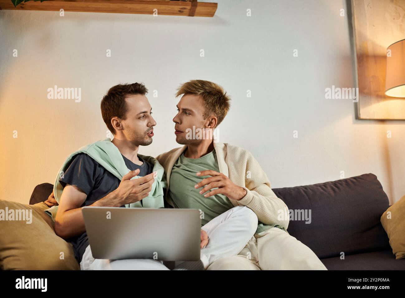 Two men chatting home hi-res stock photography and images - Alamy