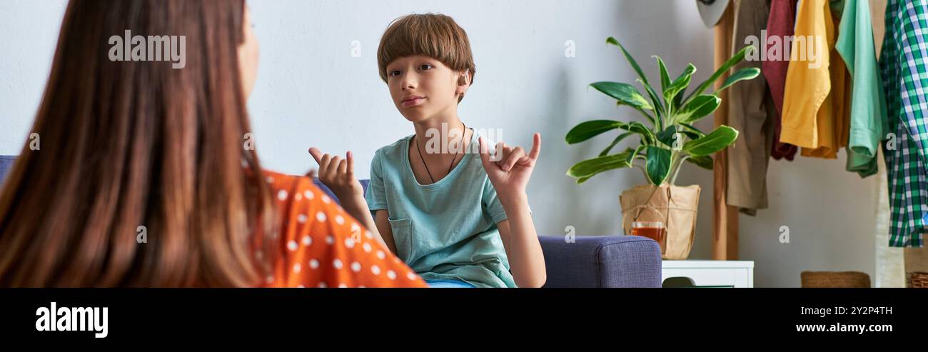 A mother enjoys a heartwarming conversation with her son using sign ...