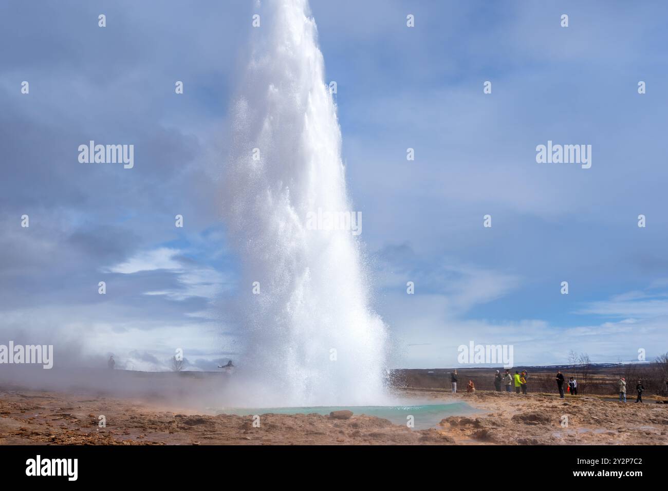 Geysir Geothermal Area, Iceland - May 6, 2024: Tourists marvel at the ...