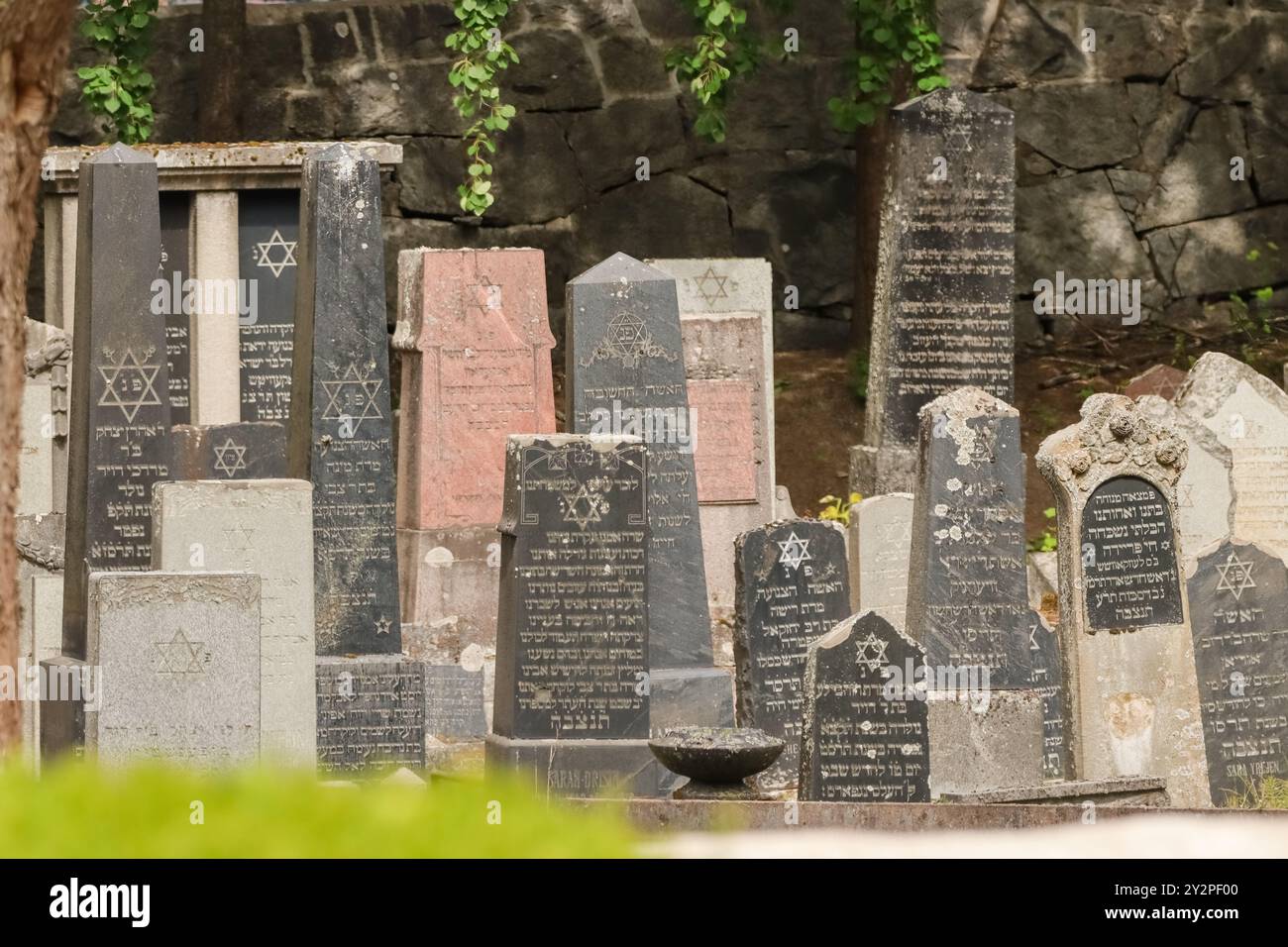 An old Jewish cemetery in Hietaniemi, Helsinki. Several tombstones have ...