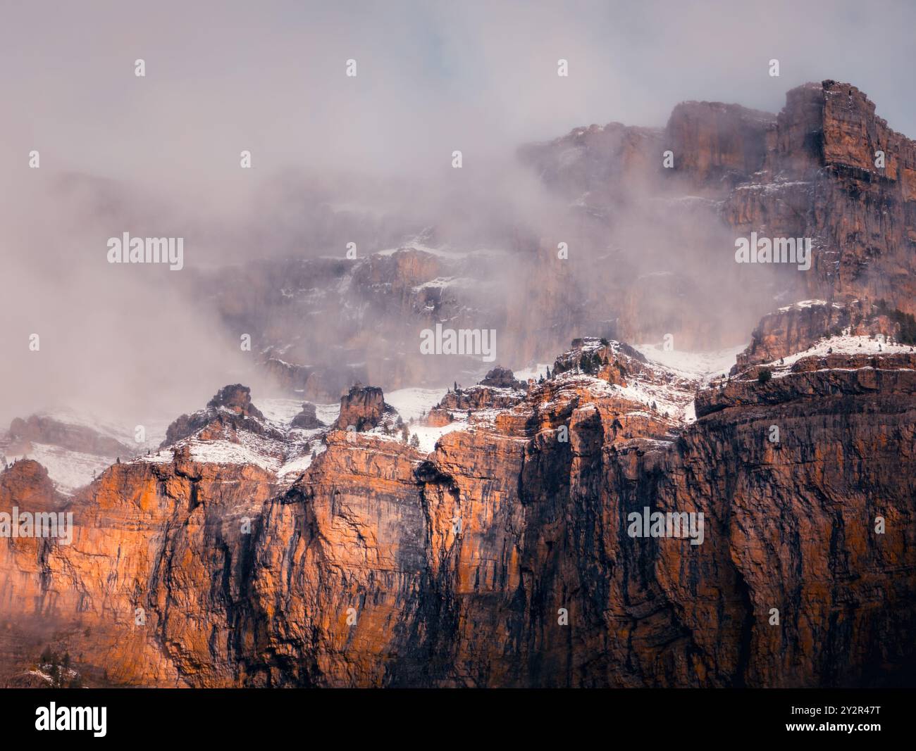 Majestic cliffs of the Aragonese Pyrenees beneath a mystical veil of ...