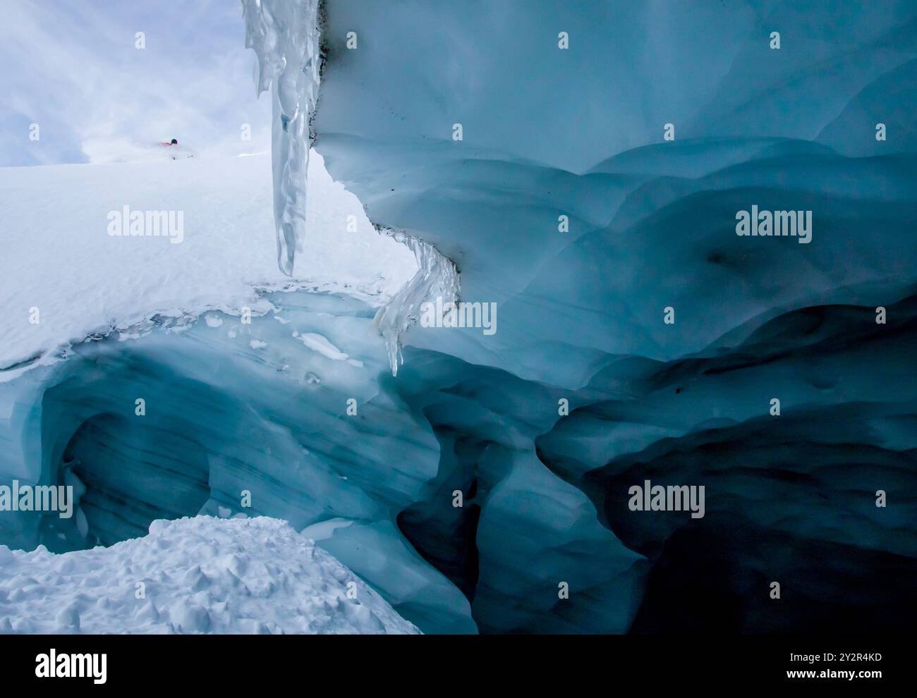 A breathtaking view of an ice cave in the Swiss Alps near Zermatt ...