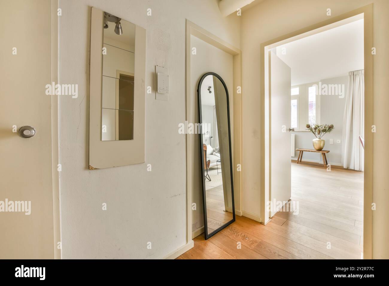 Open doorway leading to a , well-lit interior space featuring a full ...