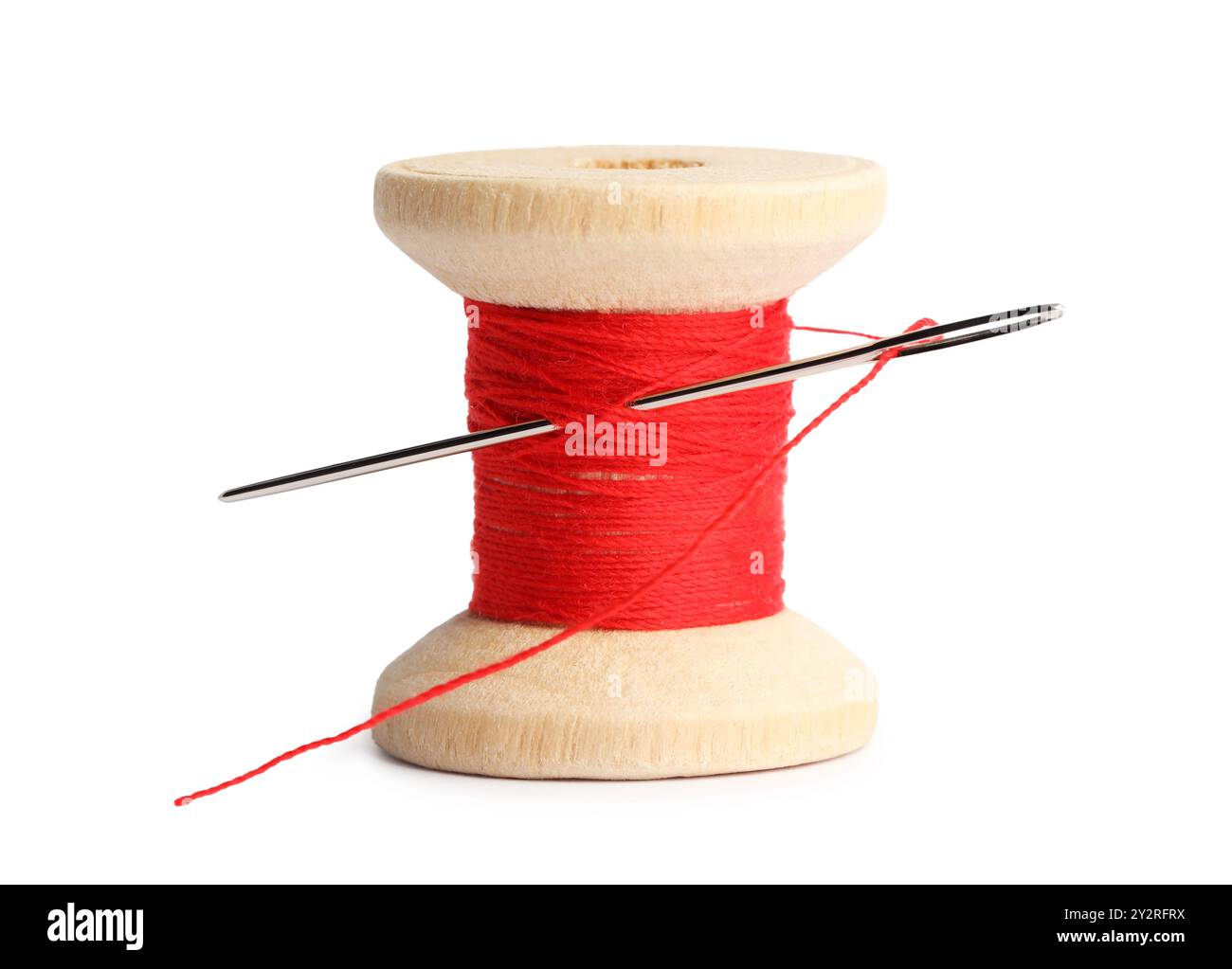 Spool of red sewing thread with needle isolated on white Stock Photo ...