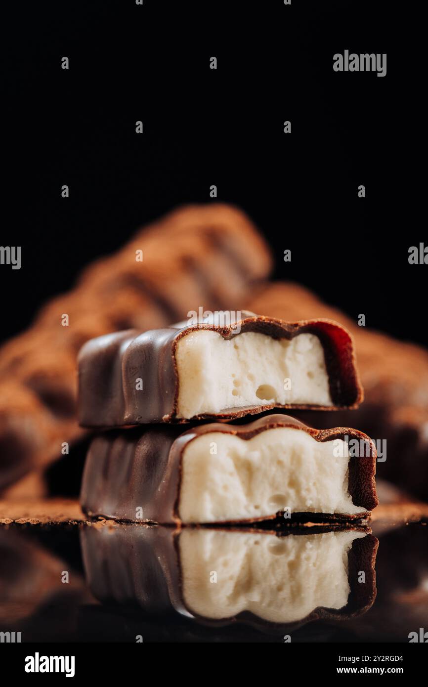 Chocolate bar with creamy filling on dark background, ideal for dessert ...
