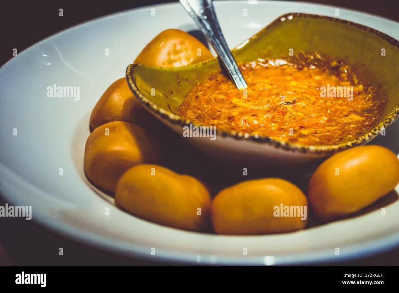 Famous Singapore chilli crab made into delicious warm dip. Served with ...