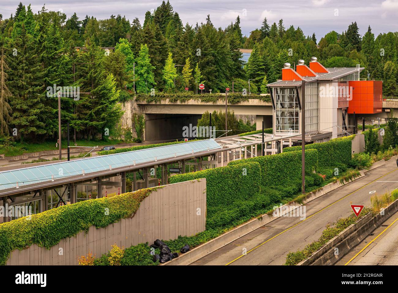 VIEW OF THE SOUND TRANSIT LIGHT RAIL STATION WITH LUSH GREEN FOLIAGE IN ...