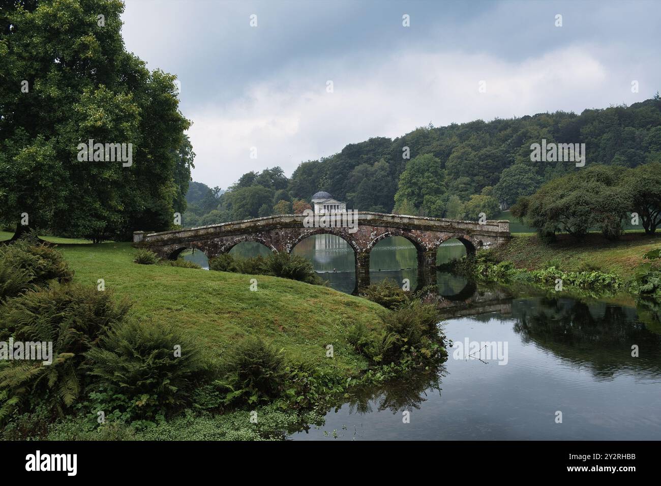 The Palladian Bridge in Stourhead in Wiltshire on a misty Summer ...