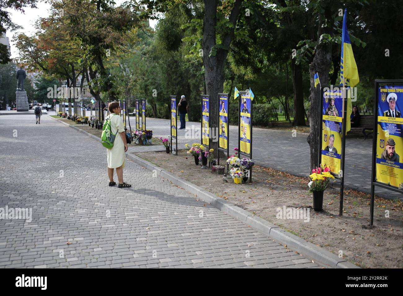 A woman looks at the plaques with the names of fallen Ukrainian ...