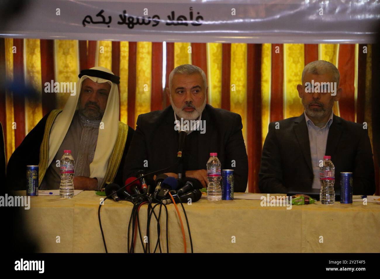 Supporters of the Oman team raise banners of Jerusalem and Palestinian ...